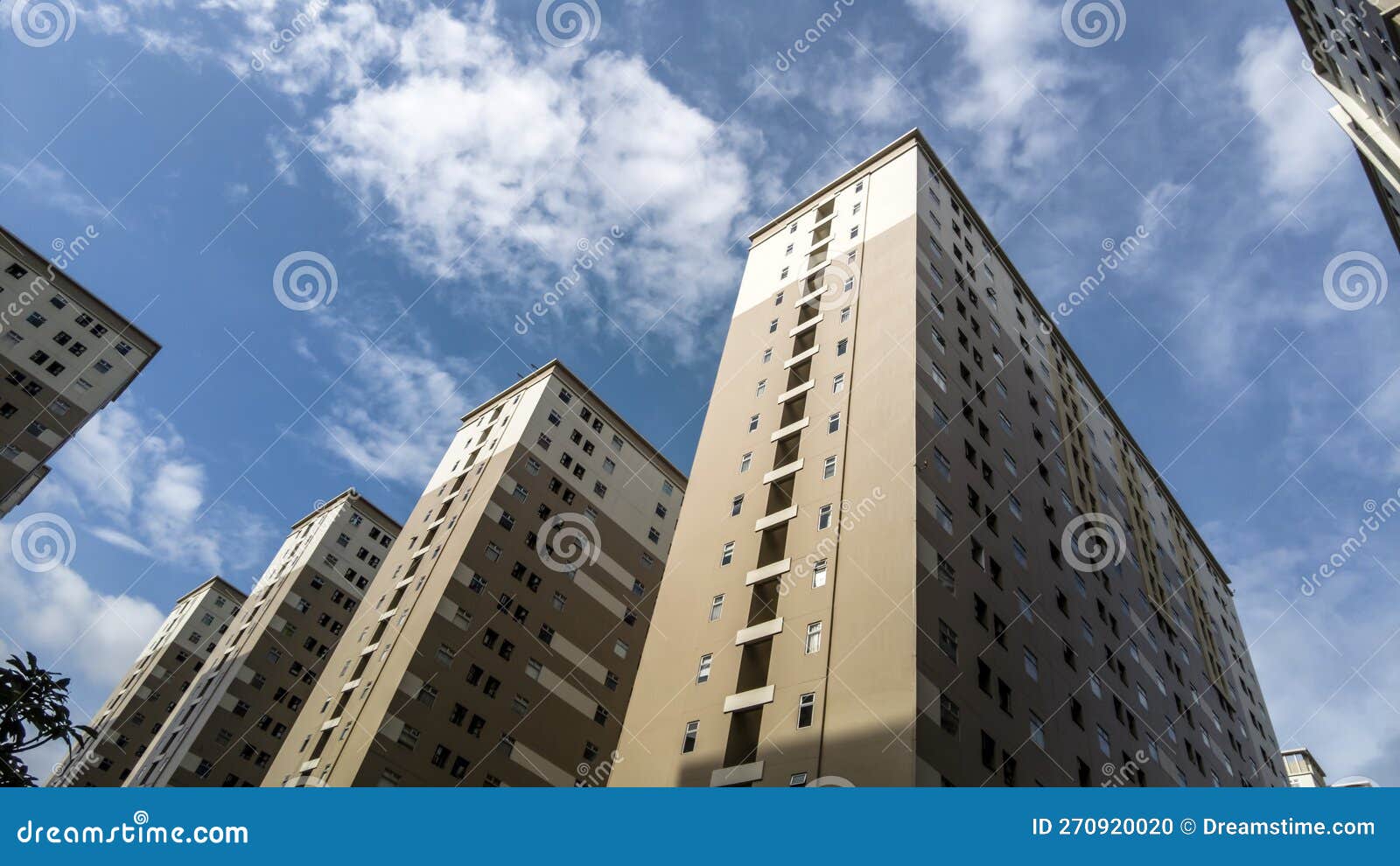 High Rise Apartment Building Complex with Blue Sky Stock Photo - Image ...