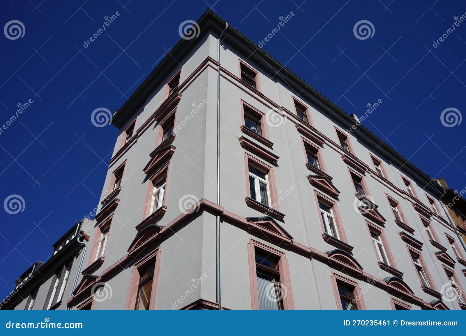 A Tall Building with Some Windows on it S Side Stock Image - Image of ...