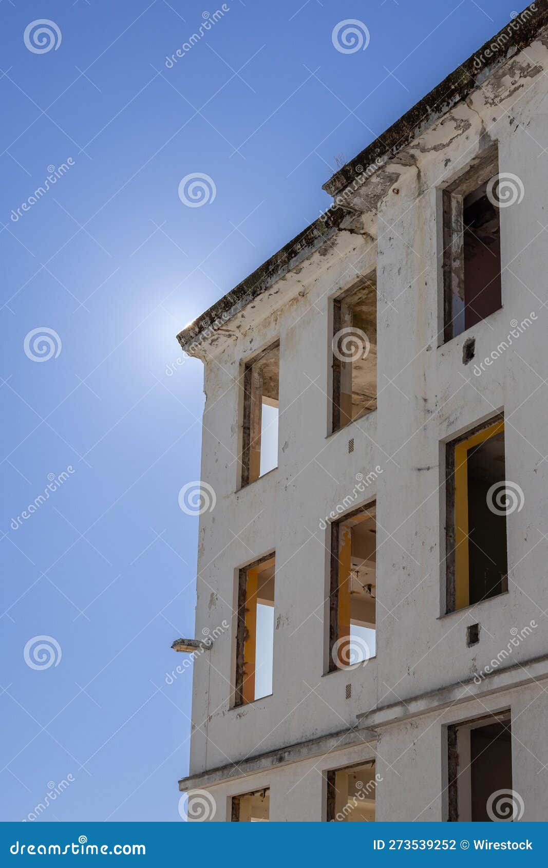 High Rise Building with Broken Windows Illuminated by Daylight ...