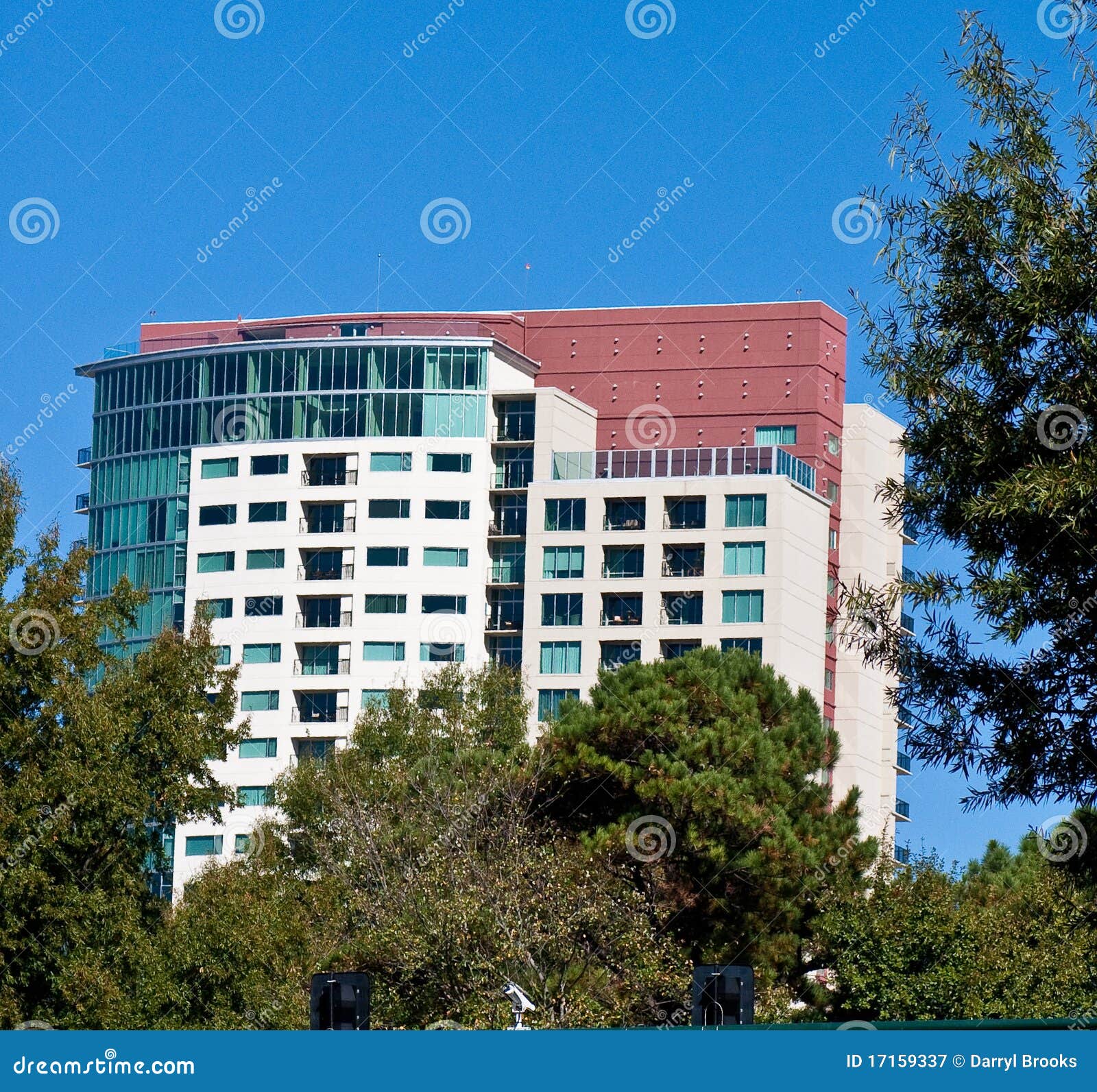 High Rise Condo Building Rising Out of Trees Stock Image - Image of ...
