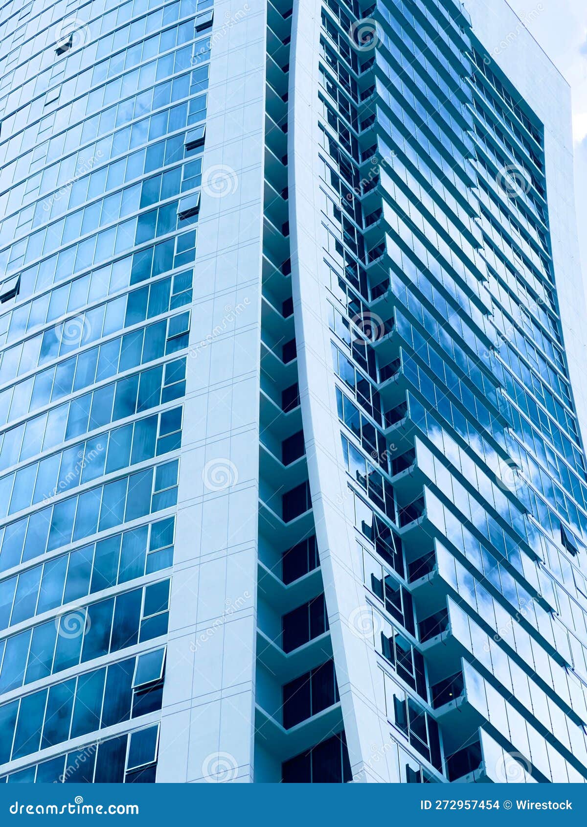 High-rise Modern Glass Building Reflecting the Blue Sky. Stock Photo ...