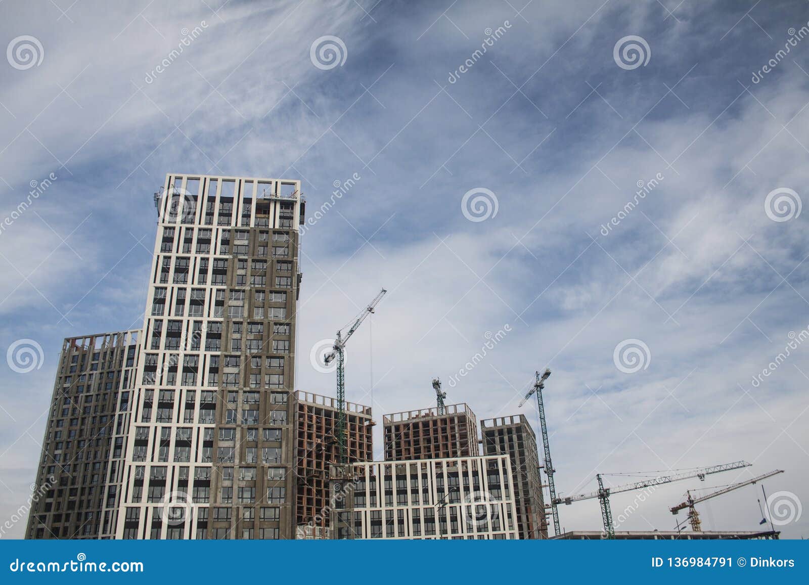 High-rise Multi-storey Buildings Under Construction. Tower Cranes Near ...