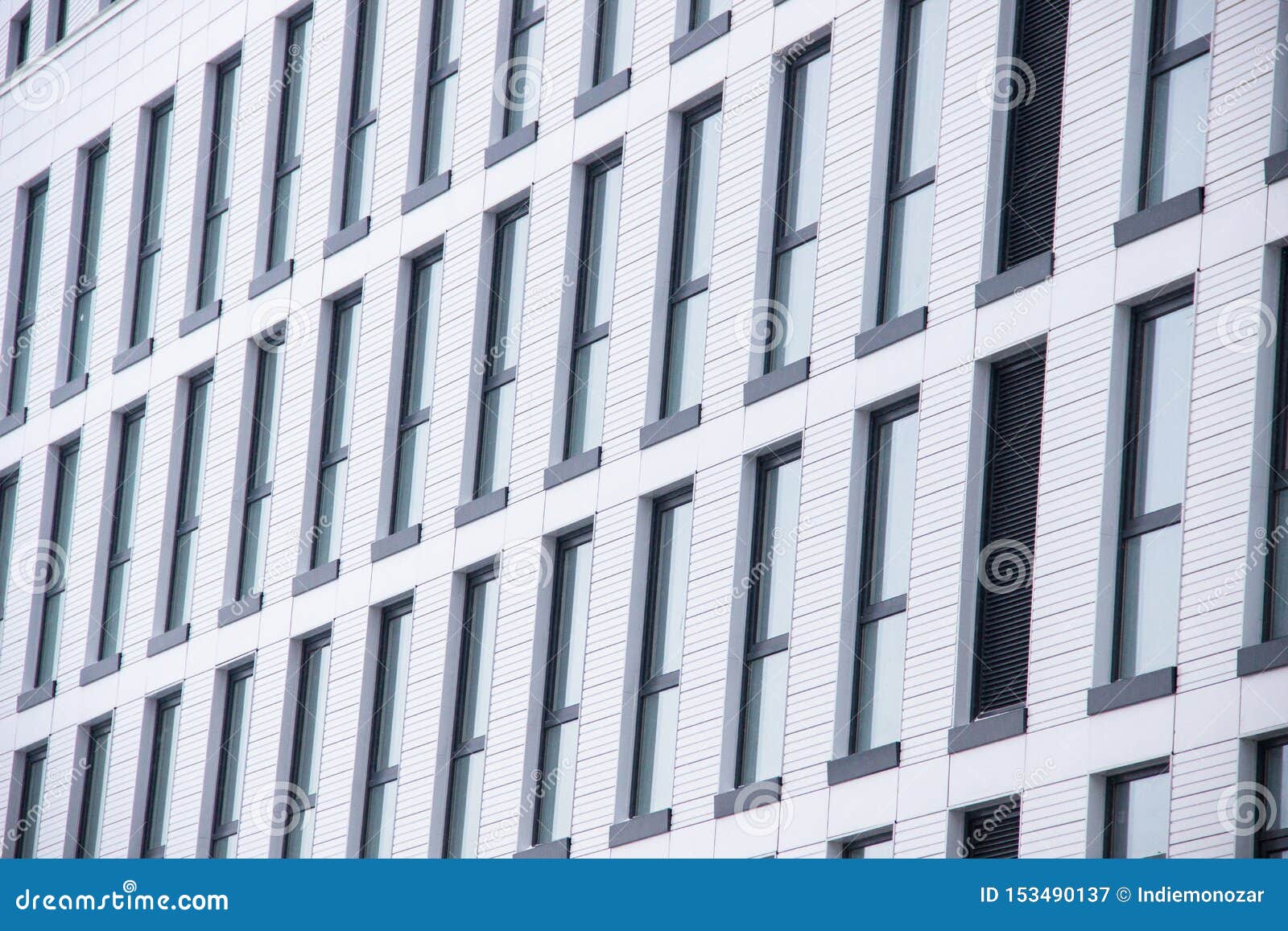 A High-rise Office Building with Blue Glass Windows Stock Image - Image ...