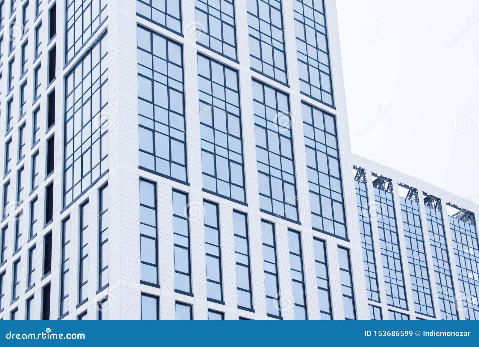 A High-rise Office Building with Blue Glass Windows Stock Image - Image ...