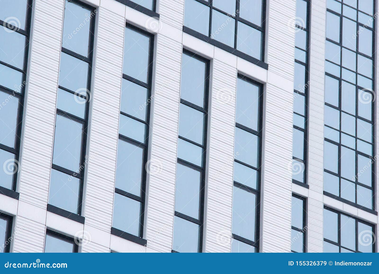 A High-rise Office Building with Blue Glass Windows Stock Image - Image ...