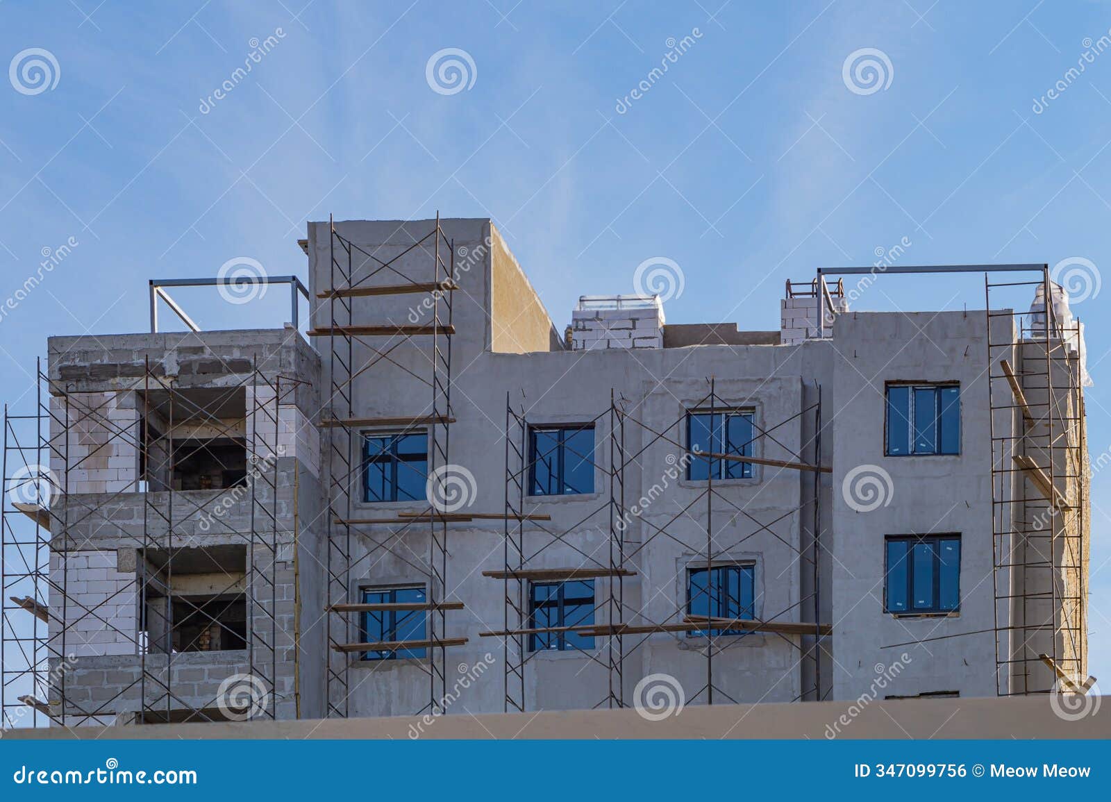 High-rise Small Building during Construction, Installation of Window ...