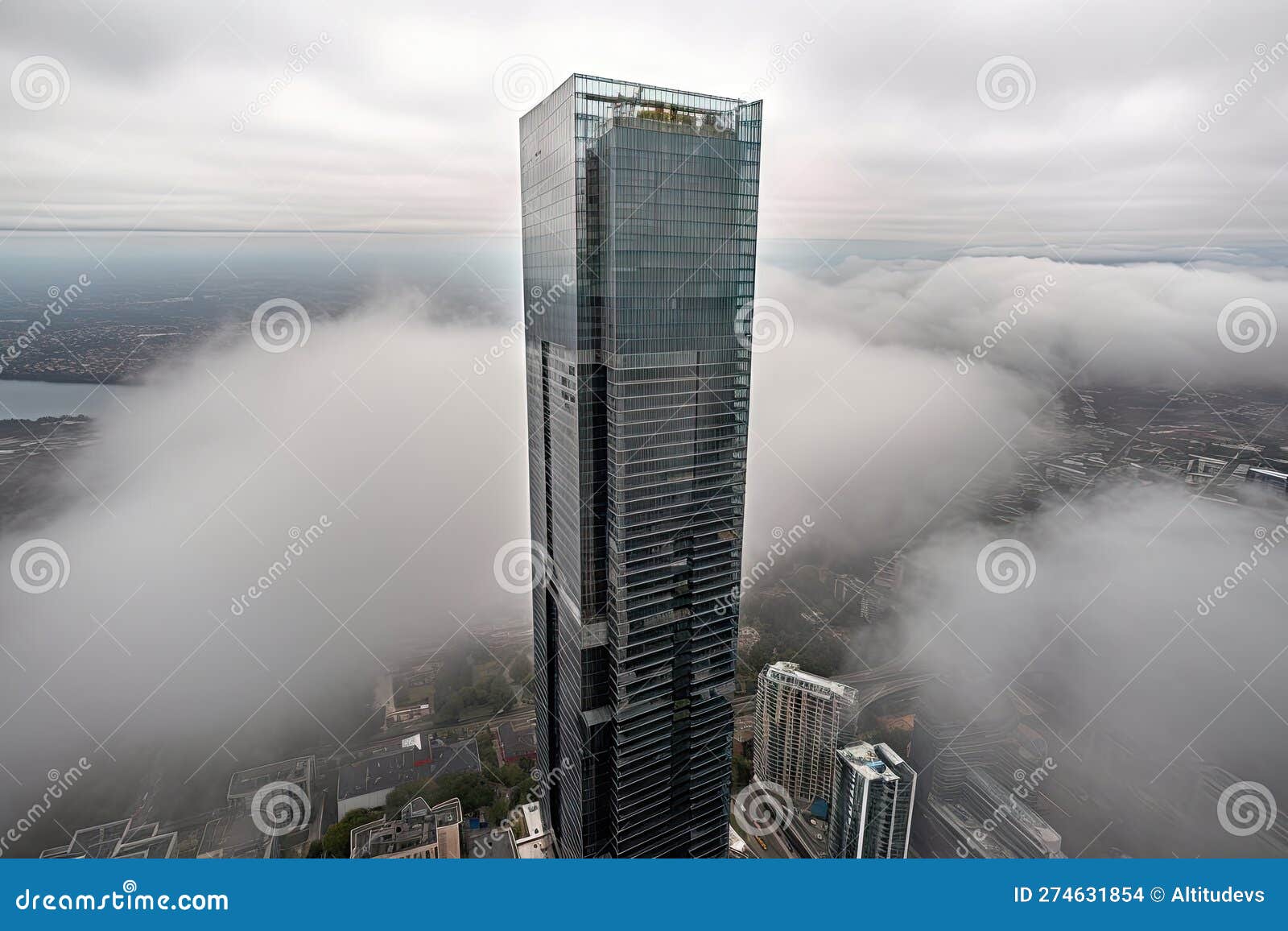 High-rise Tower, with View of the City Skyline, Surrounded by Clouds ...