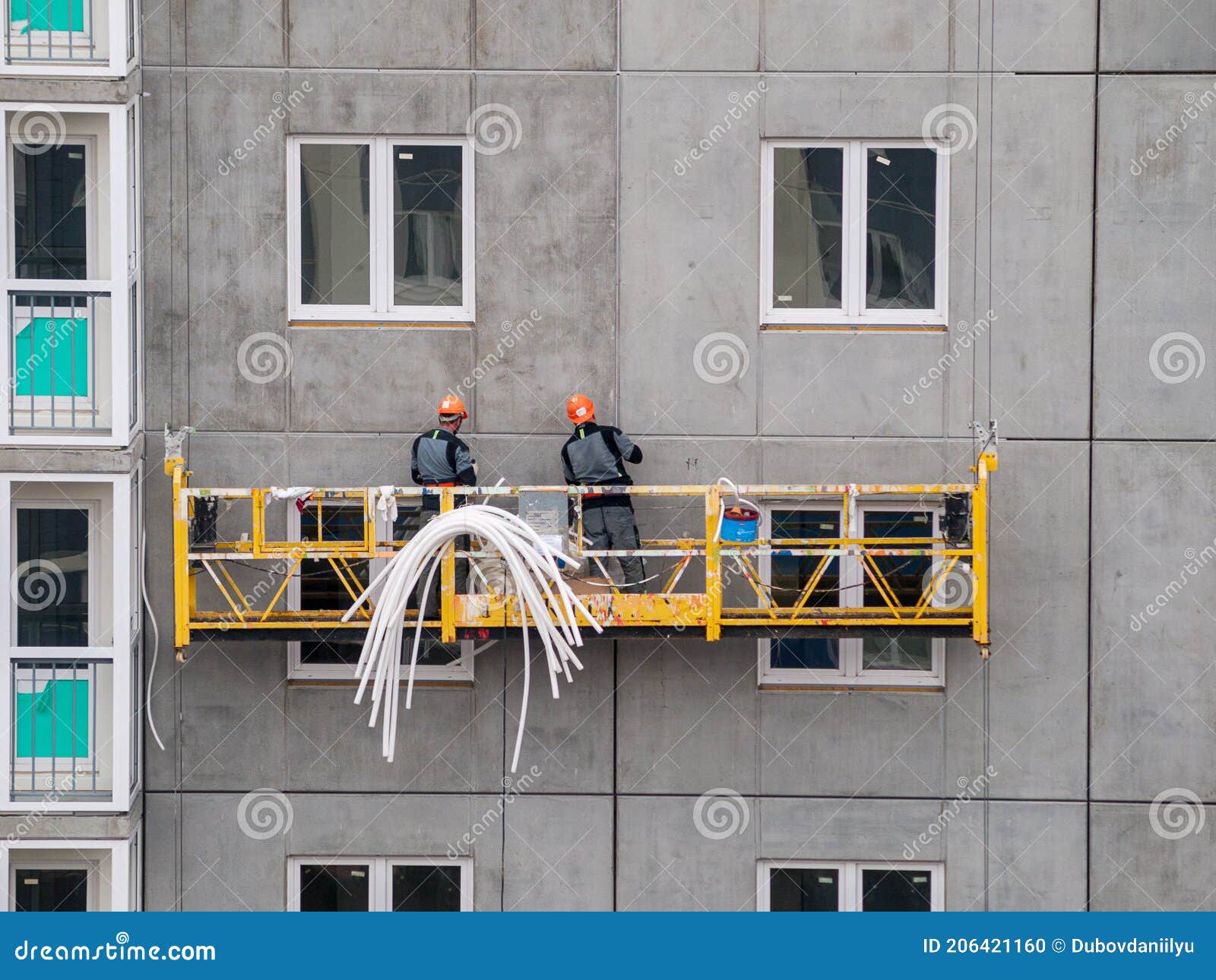 High-rise Workers Work on the Lift in the Construction of High-rise ... High-rise Workers Work on the Lift in the Construction of High-rise ...