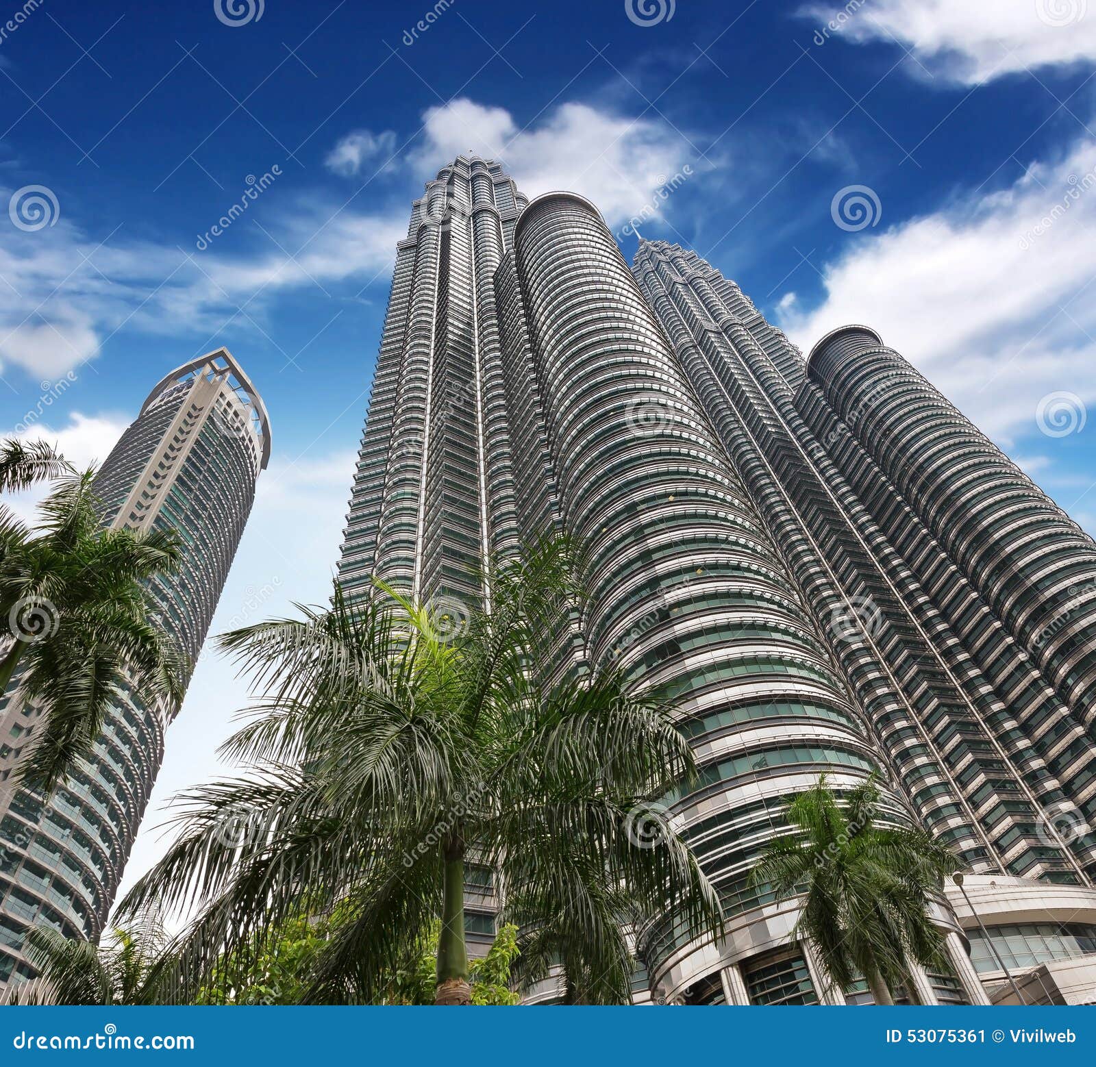 High-rises under blue sky stock image. Image of cityscape - 53075361