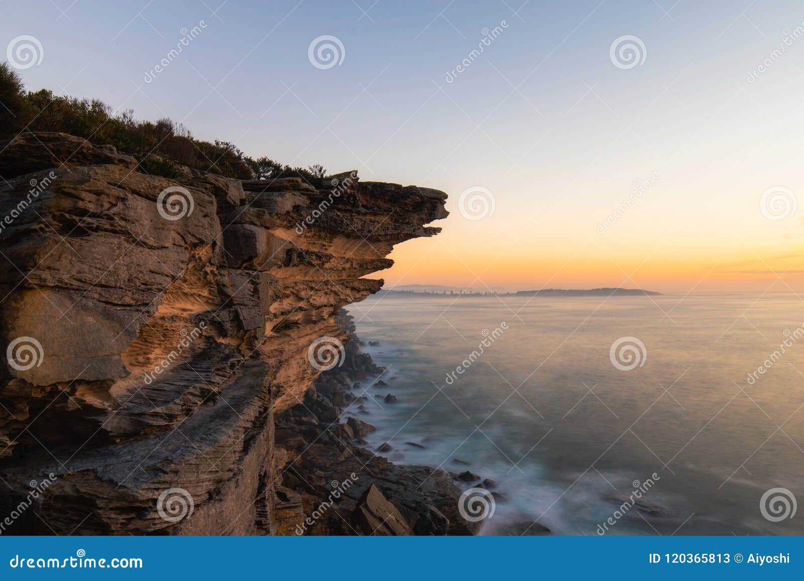 Sunrise by the rock cliff stock image. Image of australia - 120365813