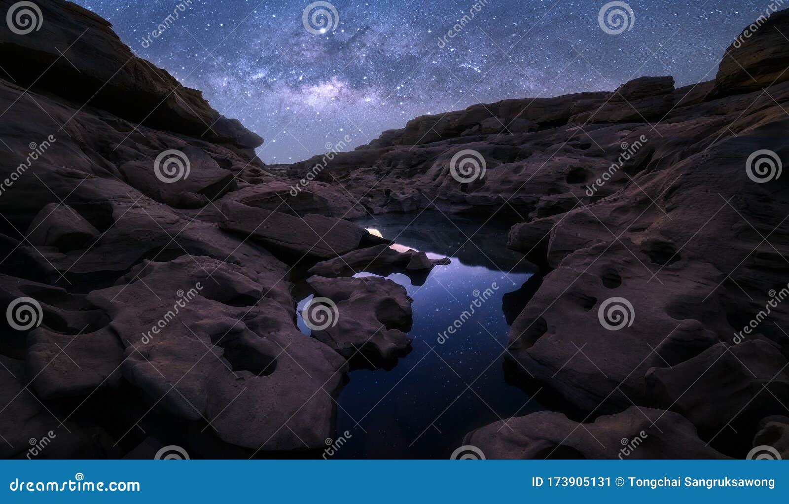 High Rock Cliffs with the Milky Way Galaxy and Reflections Stock Image ...