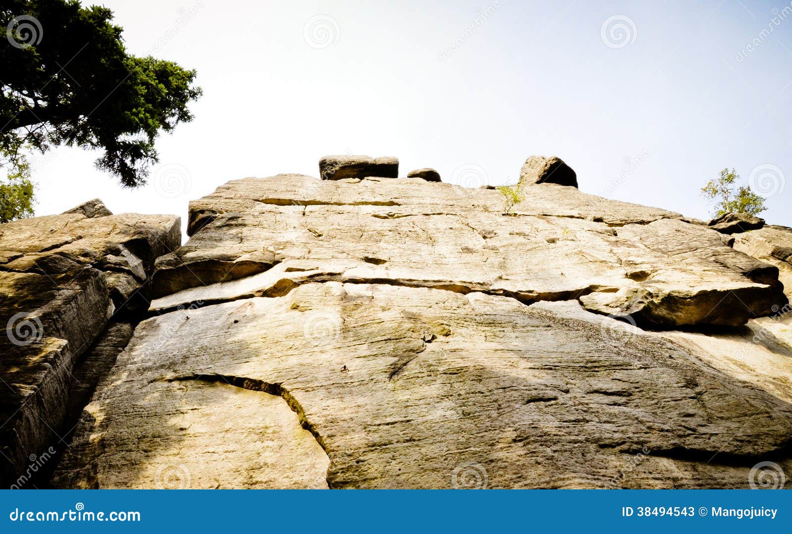 High rock wall stock image. Image of outdoor, tree, steep - 38494543