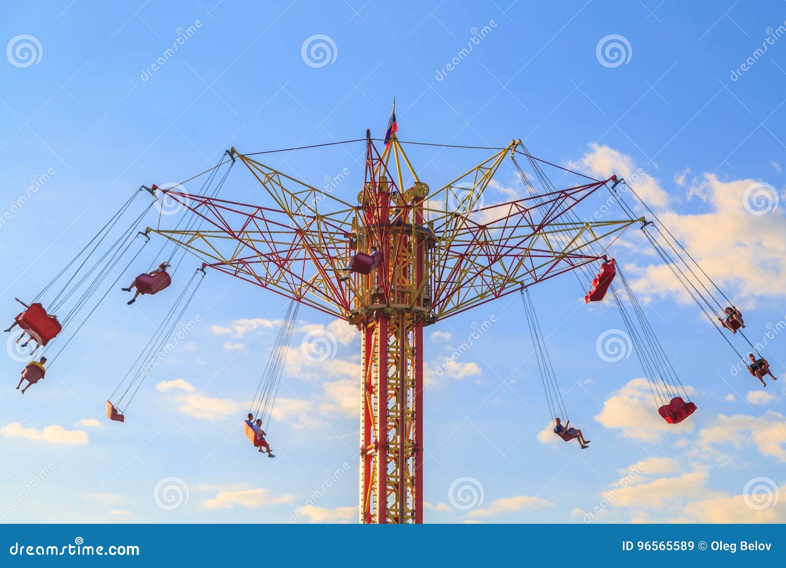 High Rolling Carousel on the Background of Blue Sky Stock Image - Image ...