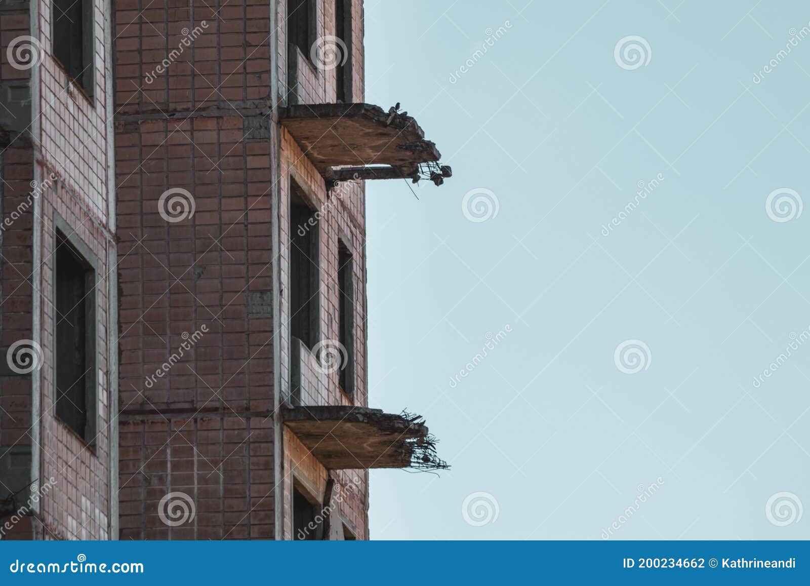 High Ruined Building Facade with Crashed Balconies Stock Photo - Image ...