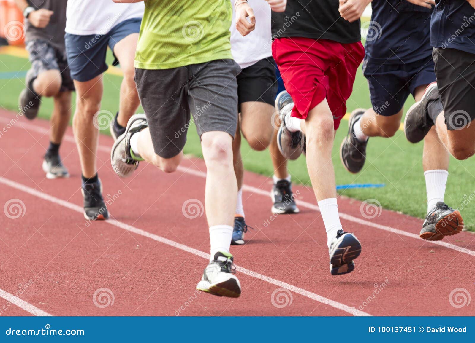 High School Boys Running in a Group on a Red Track Stock Image - Image ...