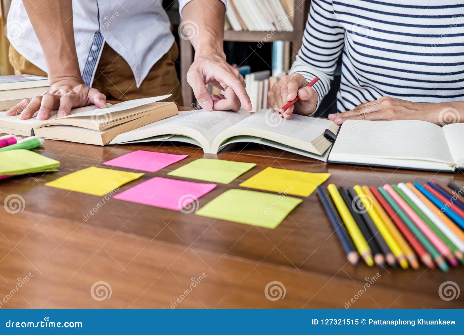 High School or College Student Group Sitting at Desk in Library Stock ...