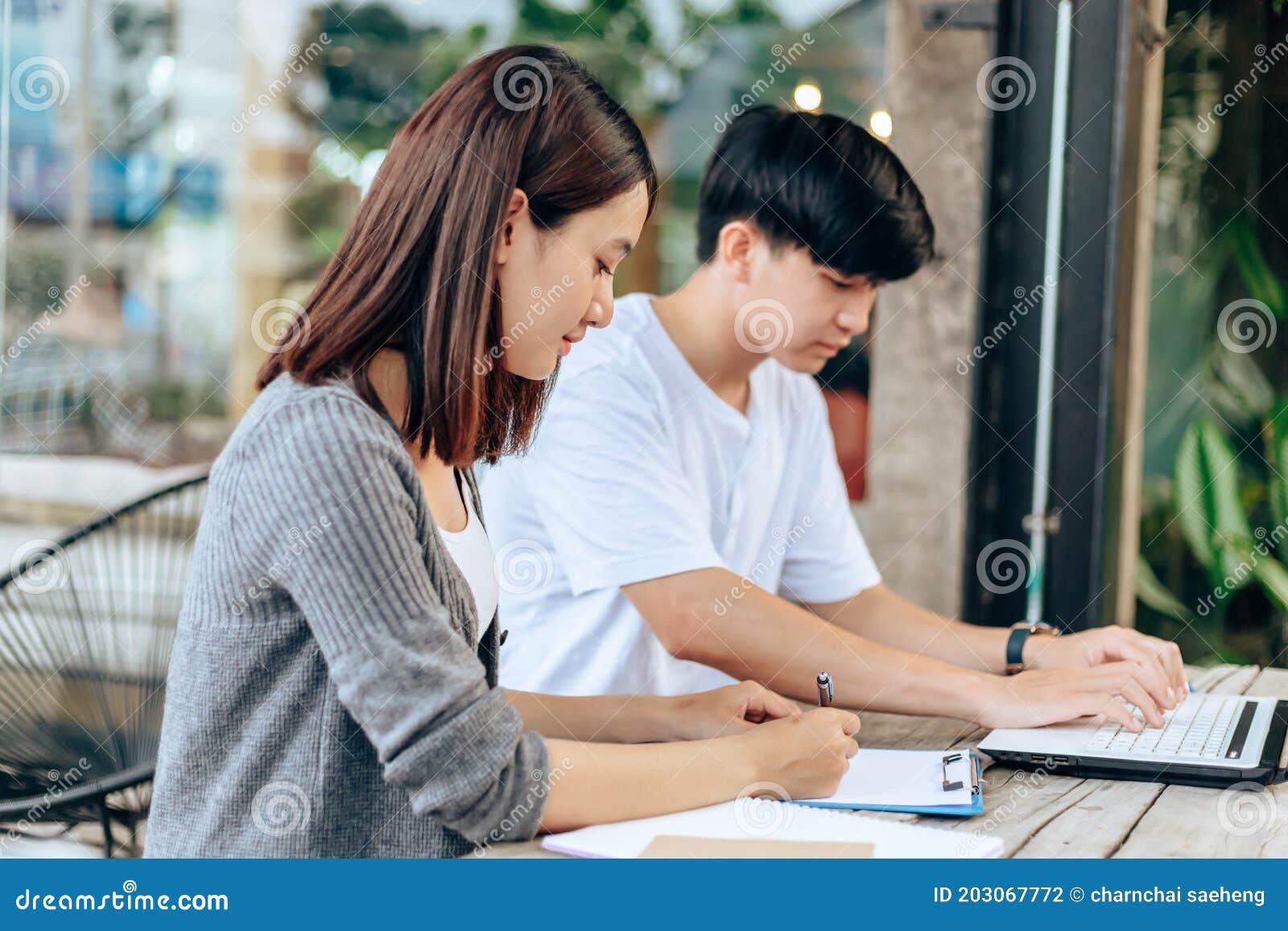 High School or College Students Group Catching Up Workbook and Learning ...