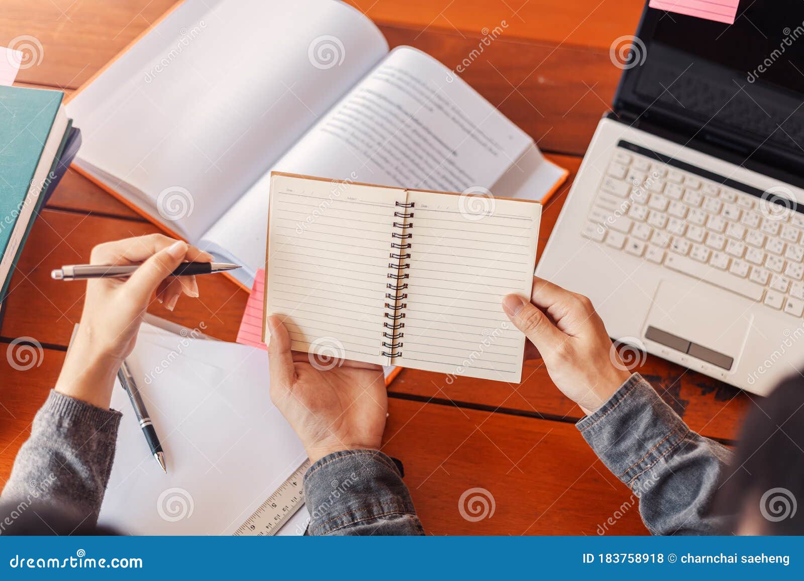 High School or College Students Group Catching Up Workbook and Learning ...