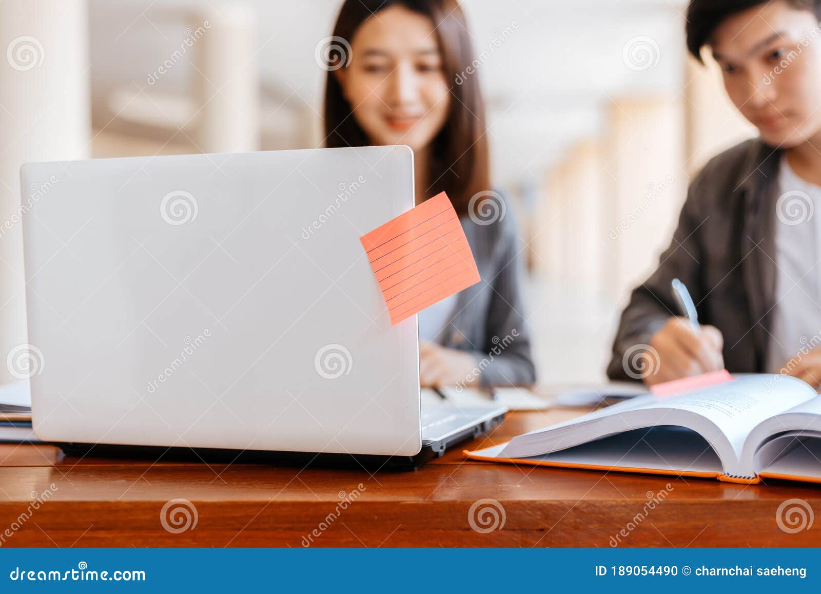 High School or College Students Group Catching Up Workbook and Learning ...