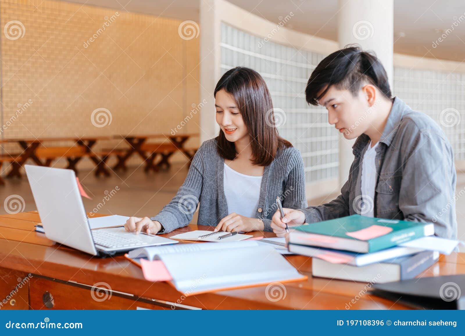High School or College Students Group Catching Up Workbook and Learning ...
