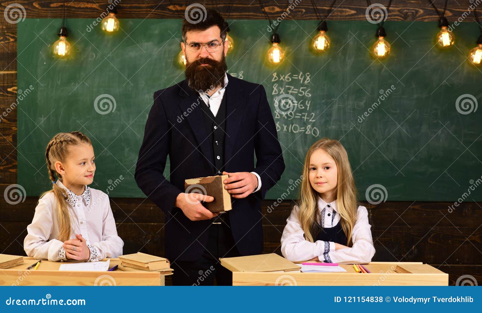 High School College Students Studying and Reading Together in Class ...