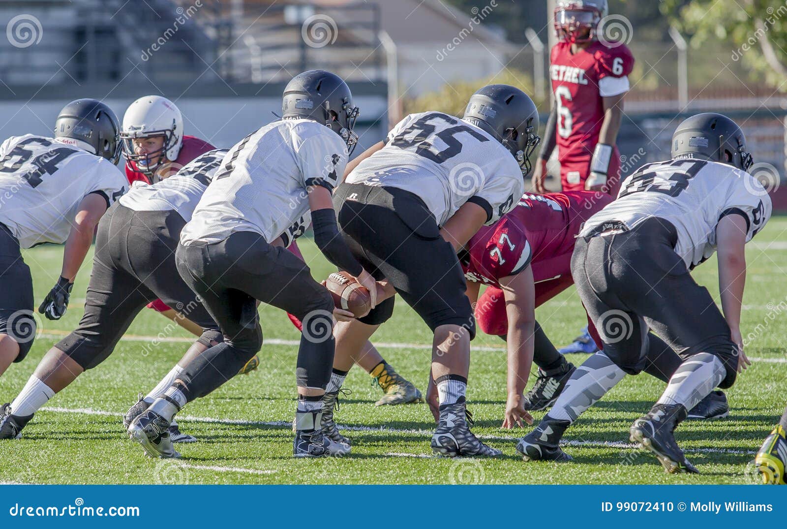 High school football snap stock photo. Image of offense - 99072410