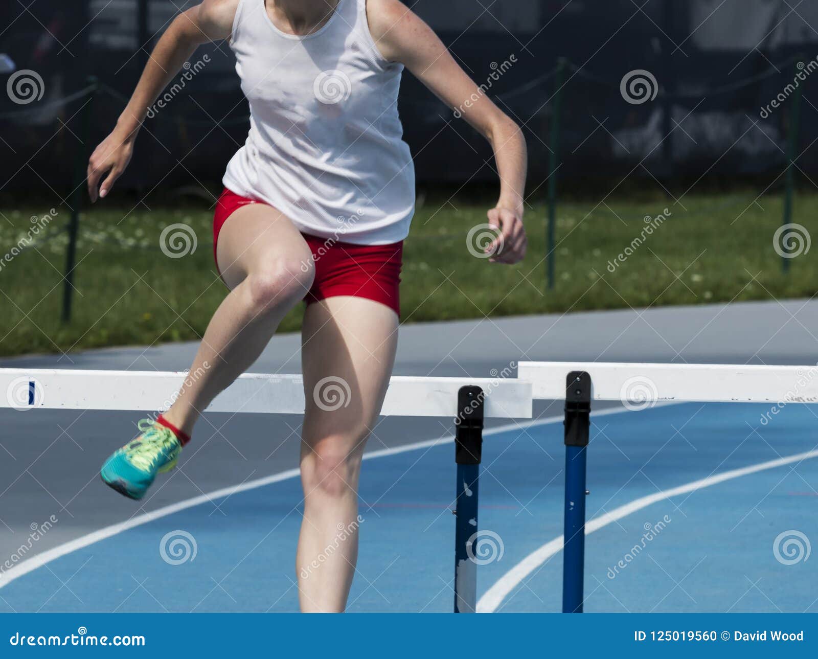 Hurdler Practicing A-skip Drill Over Hurdles Stock Image ... Hurdler Practicing A-skip Drill Over Hurdles Stock Image ...