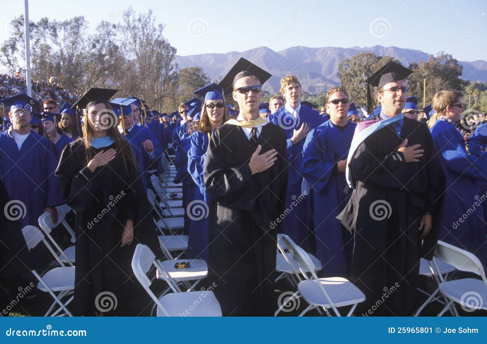 High school graduates editorial photo. Image of gowns - 25965801
