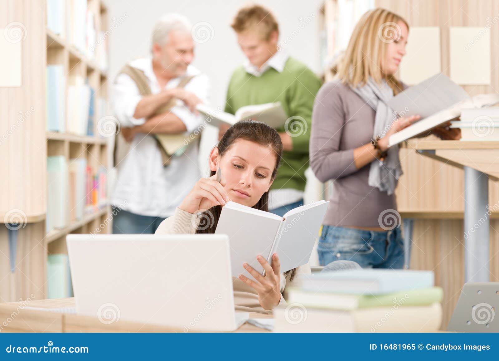 High School Library - Student Read Book Stock Image - Image of four ...