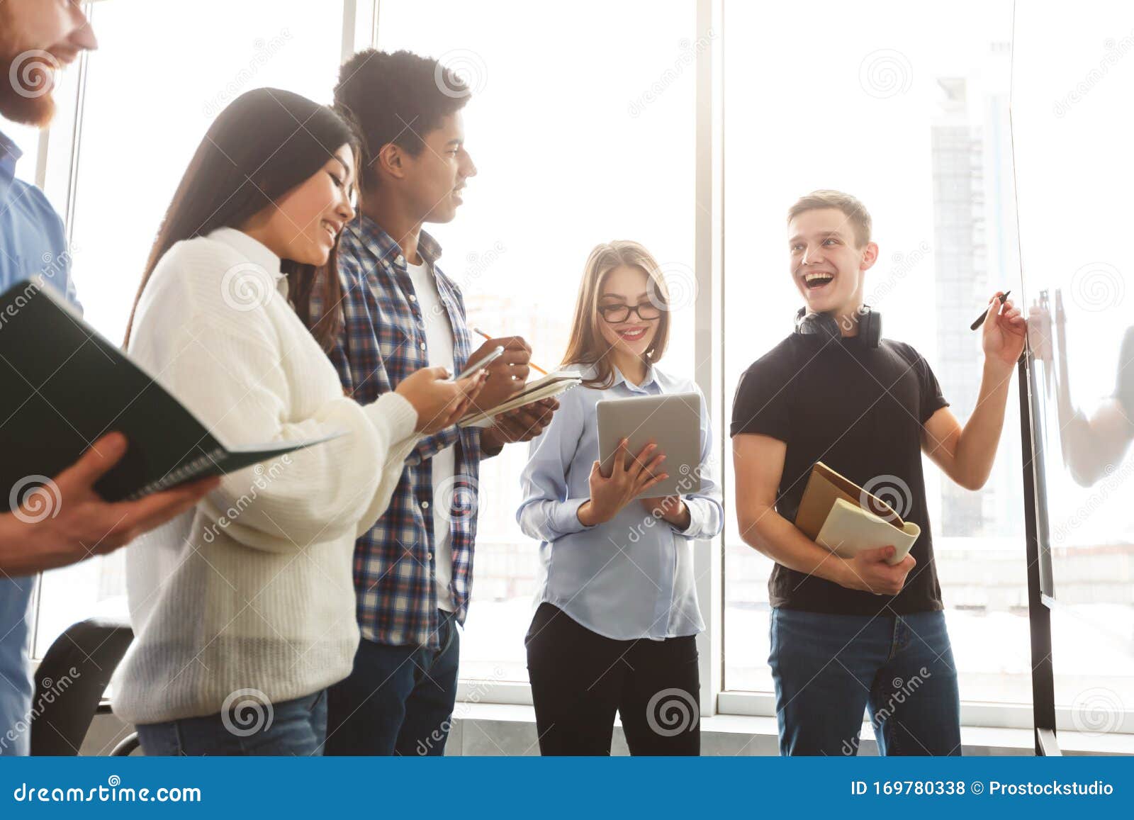 High School Pupils Discussing Math Equations in Class Stock Photo ...