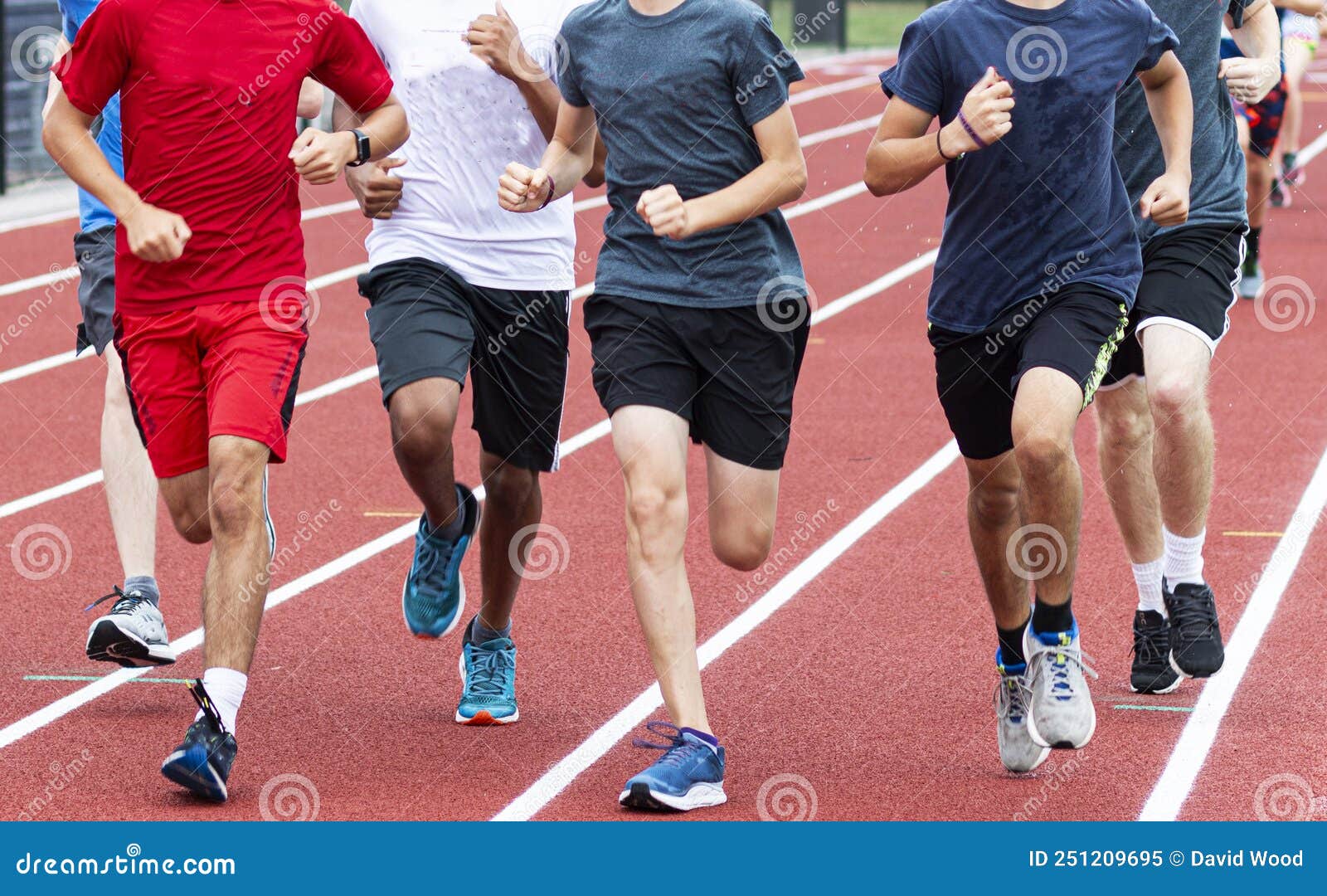 High School Runners Running Together on a Track Stock Image - Image of ...