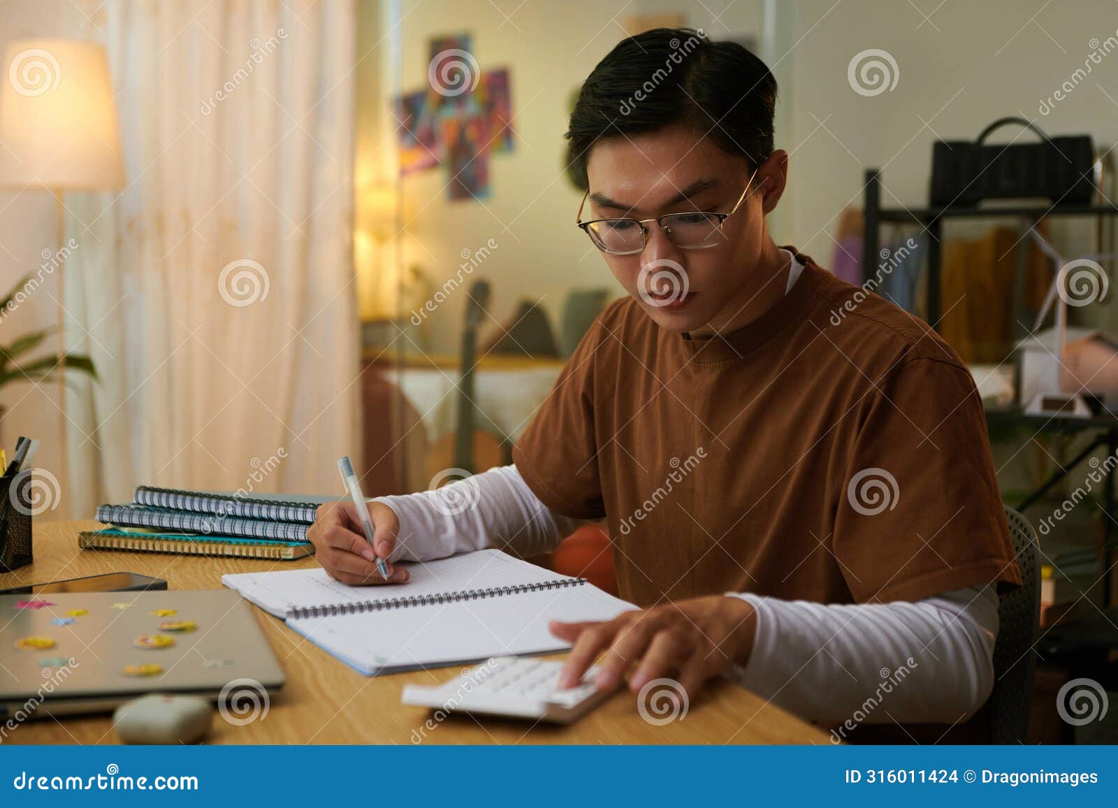Student Doing Math Homework Stock Photo - Image of study, calculate ...