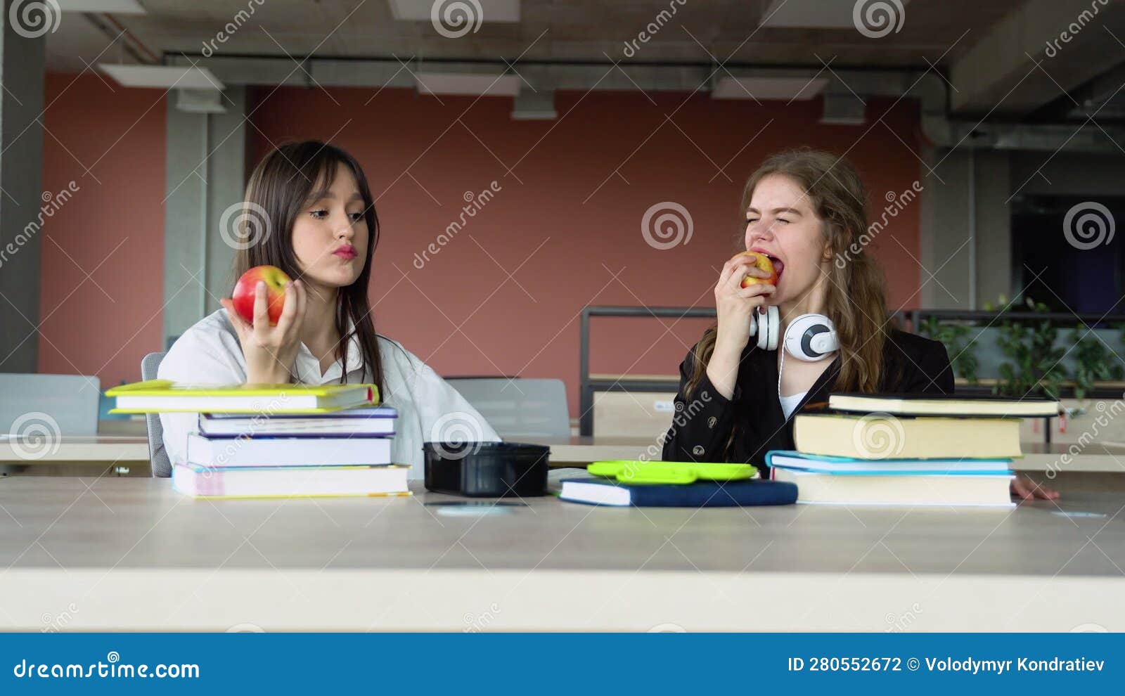 High School Student Girls Eating Lunch. Two Girls at Lunch Time in ...