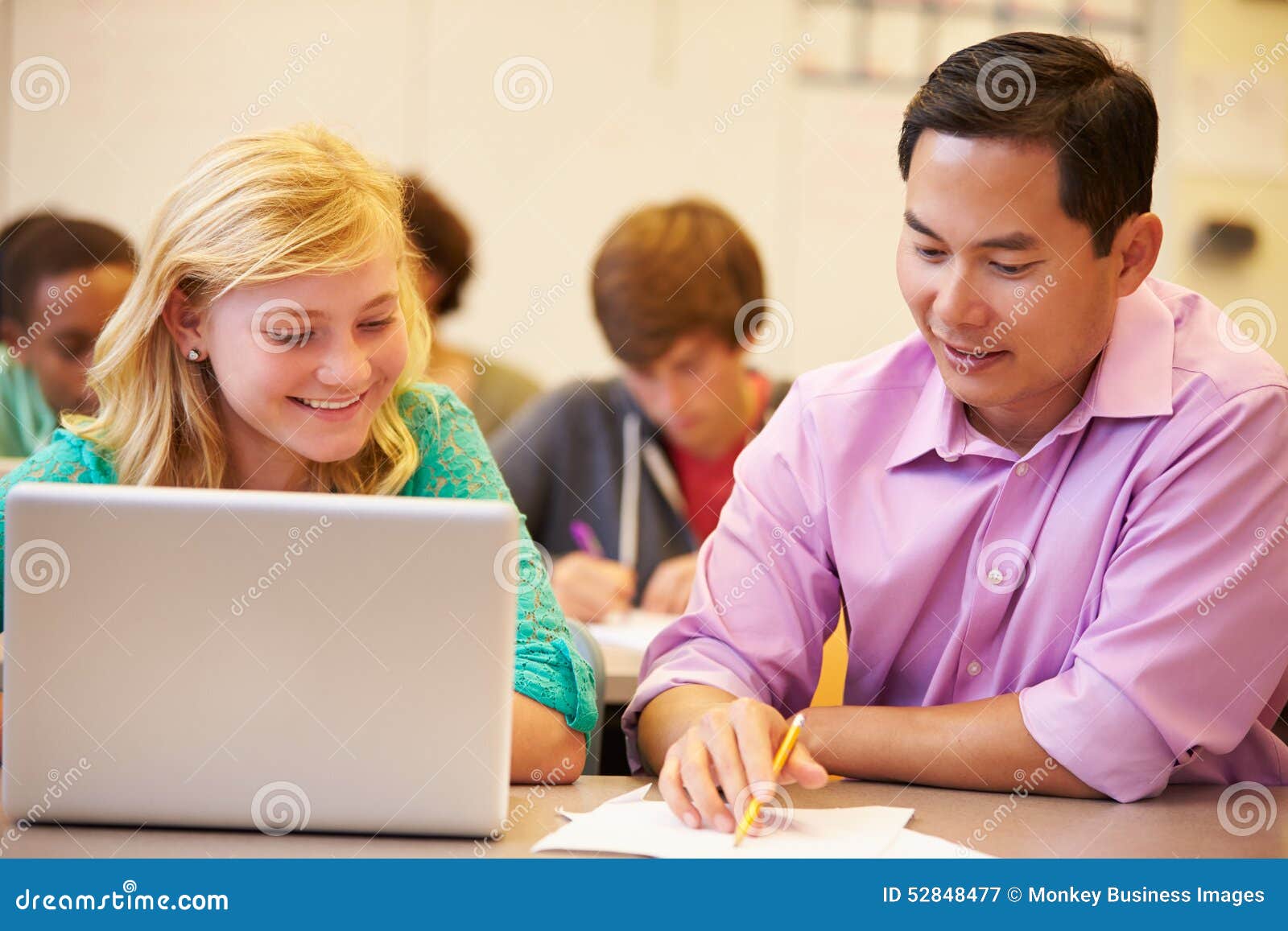 High School Student with Teacher in Class Using Laptop Stock Image ...