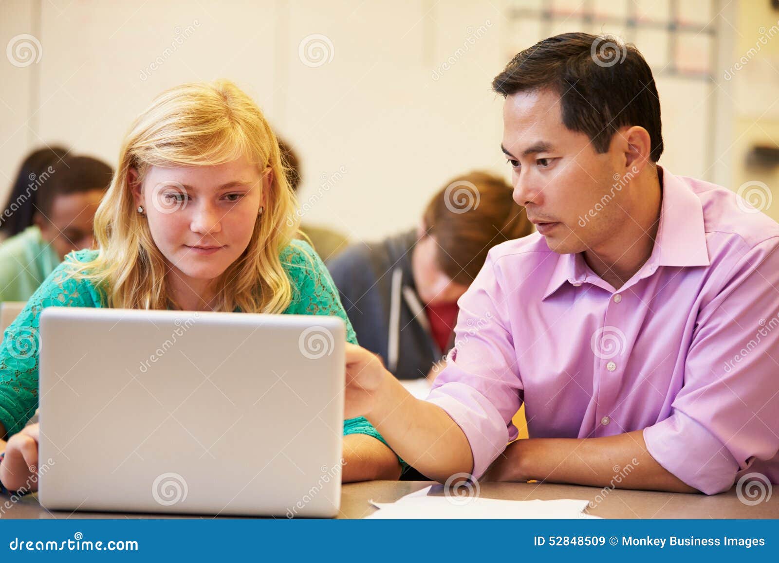High School Student with Teacher in Class Using Laptop Stock Image ...