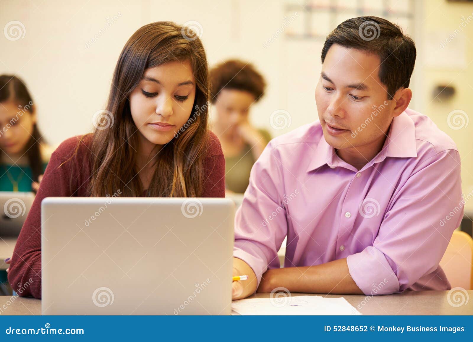 High School Student with Teacher in Class Using Laptop Stock Photo ...