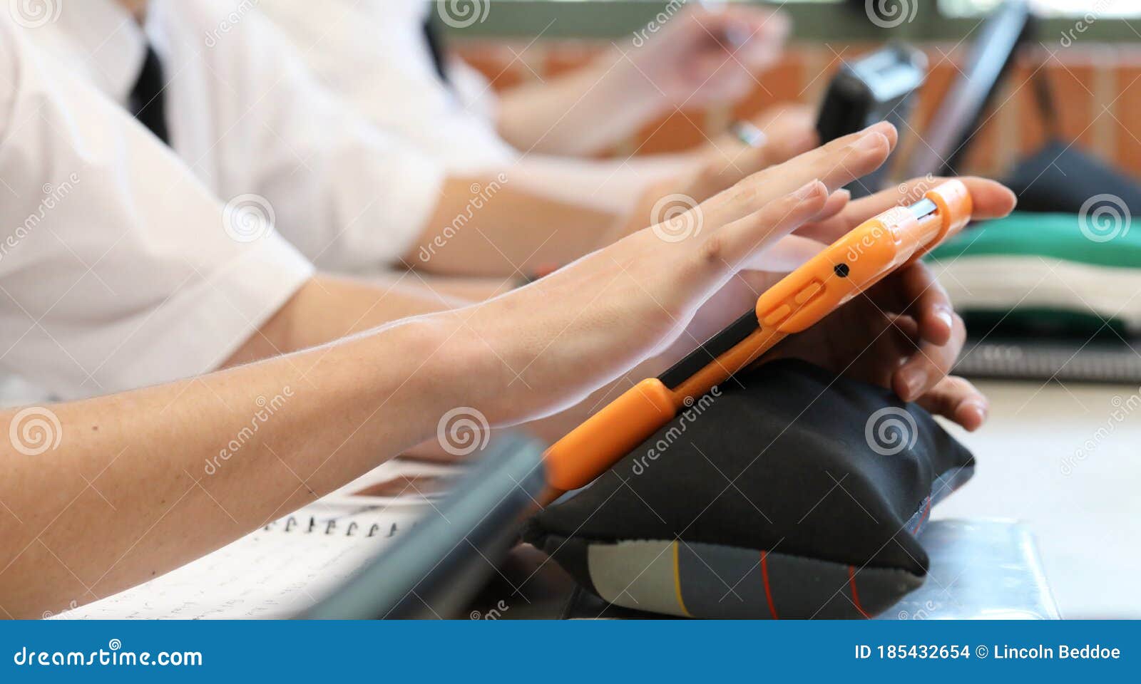Students Using Digital Technology in the Classroom. Stock Photo - Image ...