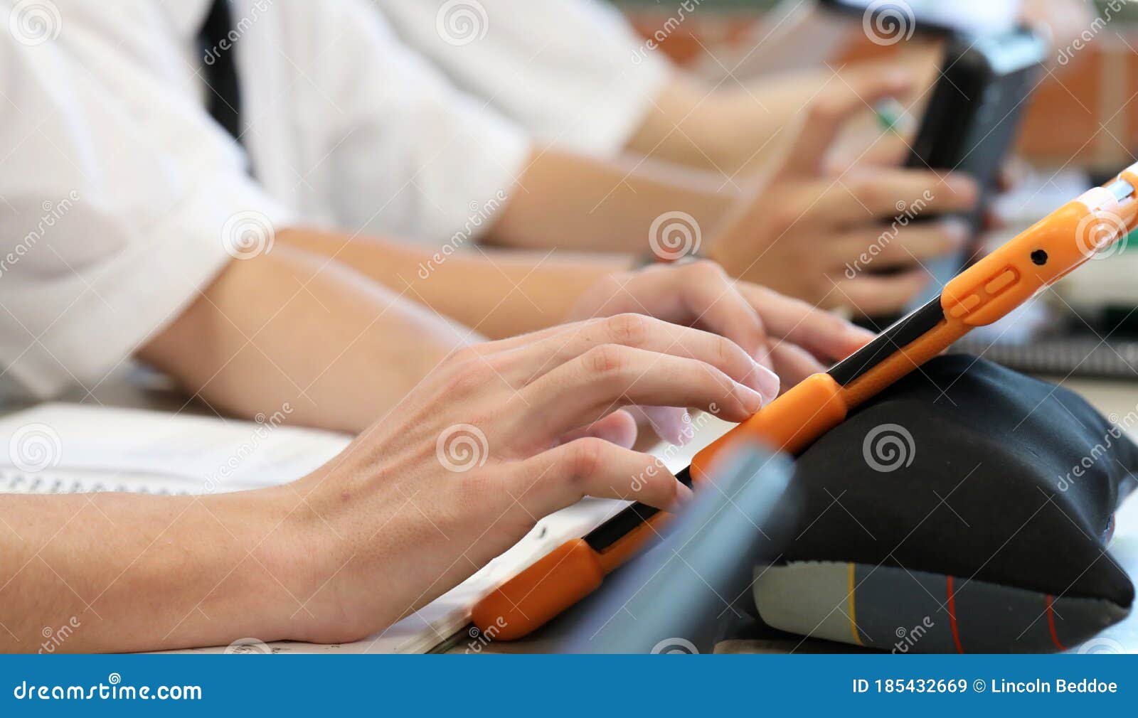 Students Using Digital Technology in the Classroom. Stock Image - Image ...