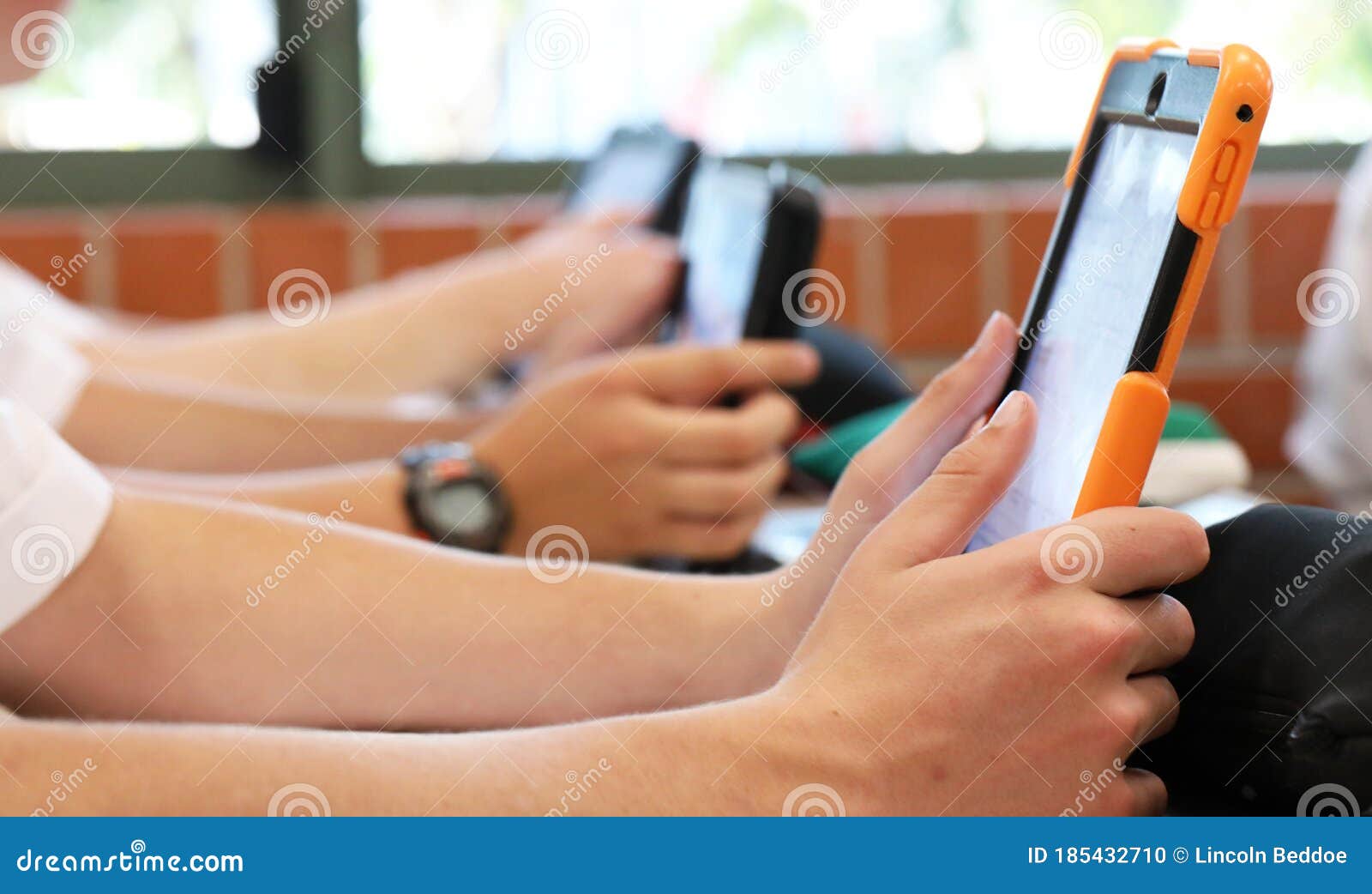 Students Using Digital Technology in the Classroom. Stock Photo - Image ...