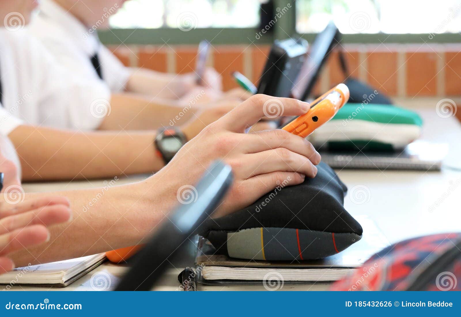 Students Using Digital Technology in the Classroom. Stock Photo - Image ...