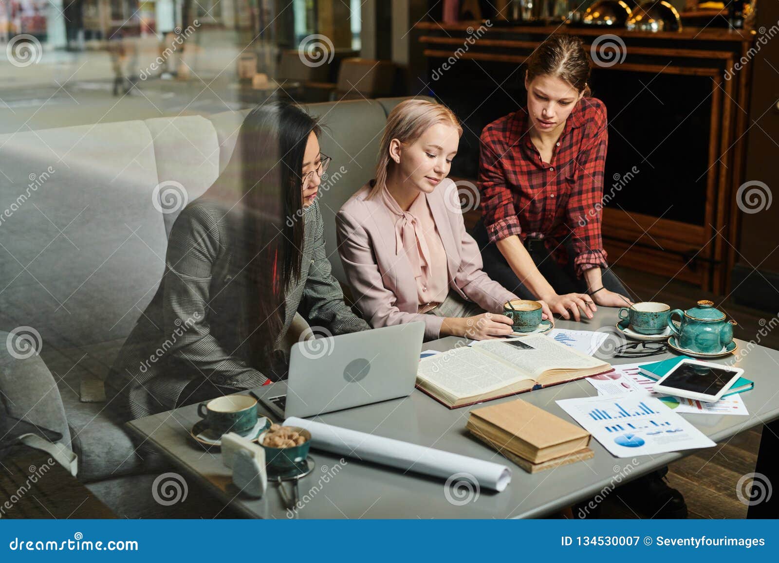 Students studying in cafe stock image. Image of modern - 134530007