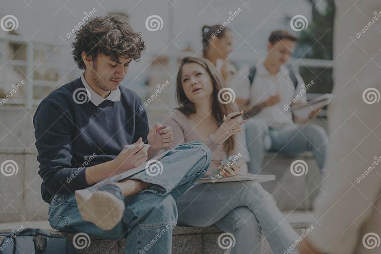 High School Students Collaborating with Professor Outdoors Stock Photo ...