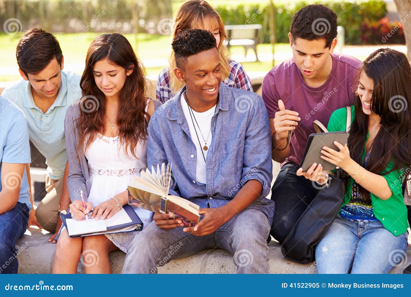 High School Students Collaborating on Project on Campus Stock Image ...