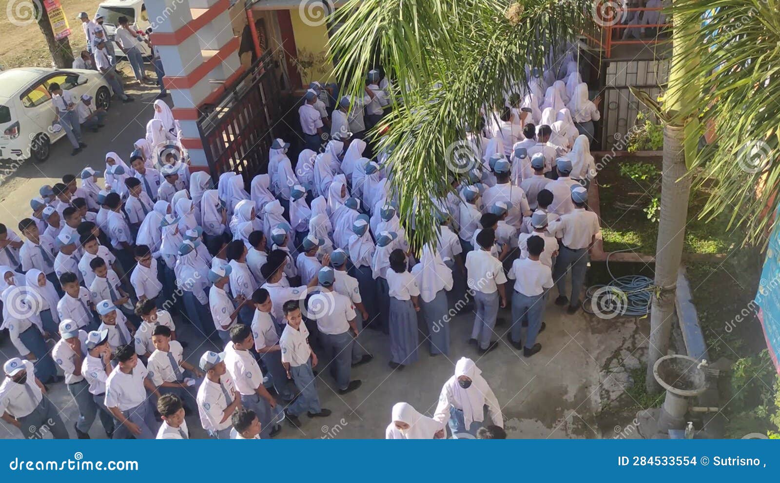 High School Students Enter the School Gate. a Crowd of High School ...