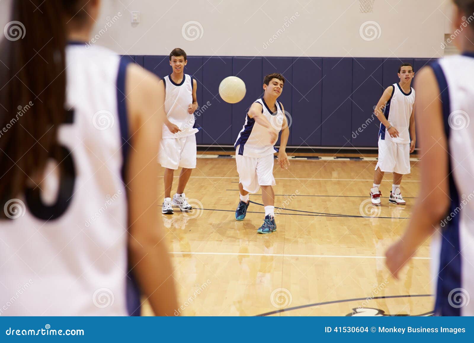 High School Students Playing Dodge Ball in Gym Stock Photo - Image of ...