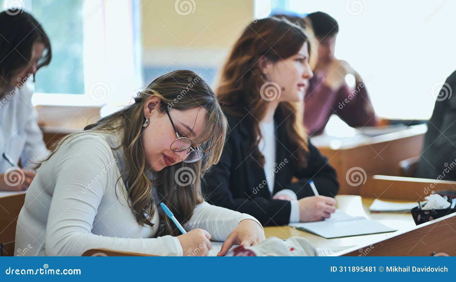 High School Students Sitting at a Desk. Stock Image - Image of learn ...