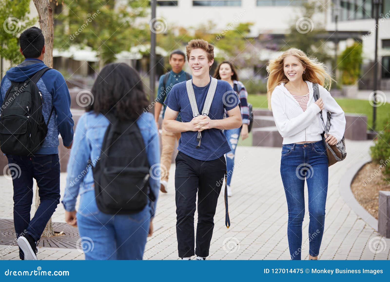 High School Students Socializing Outside College Buildings Stock Image ...