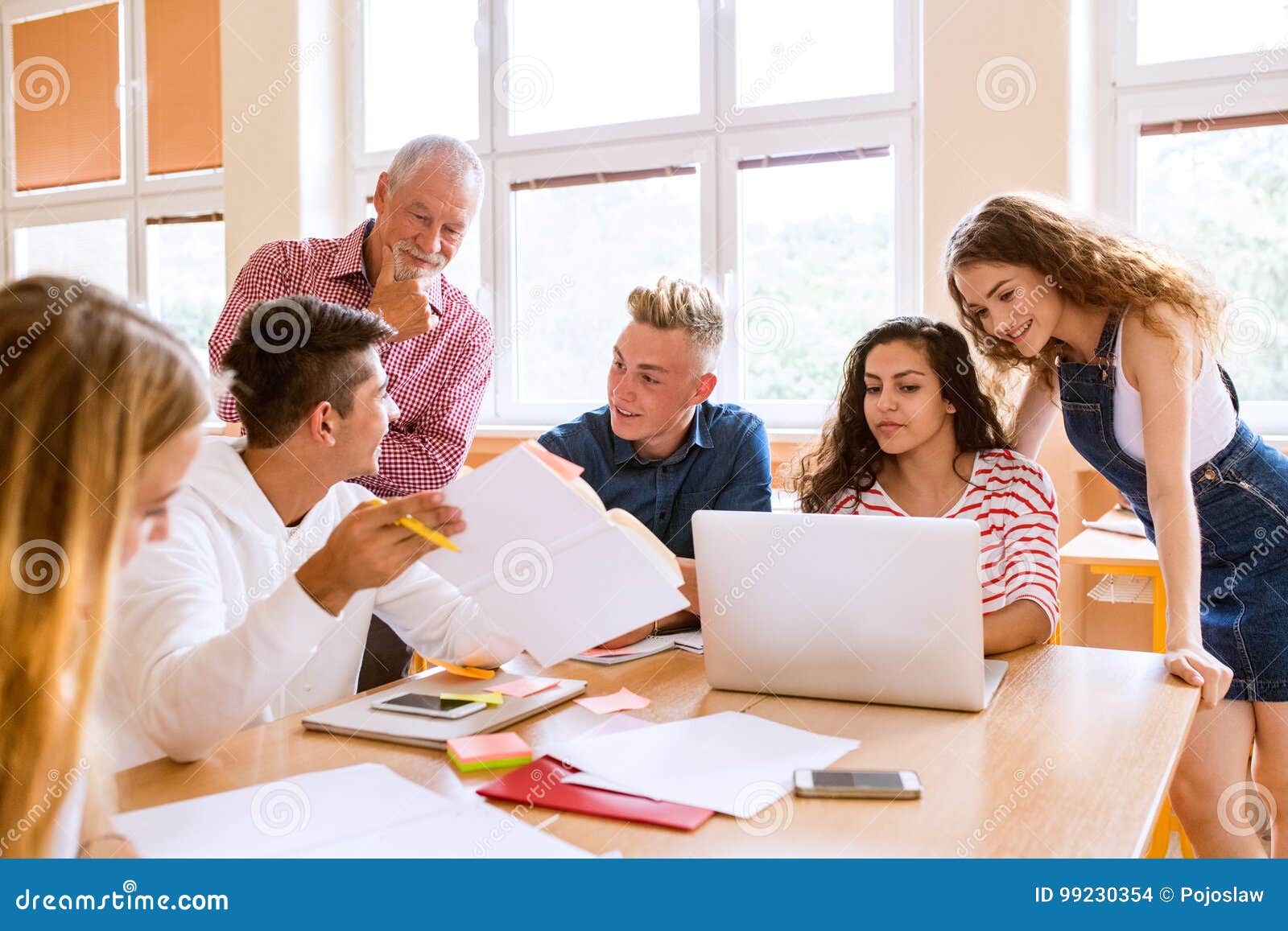High School Students and Teacher with Laptop. Stock Photo - Image of ...