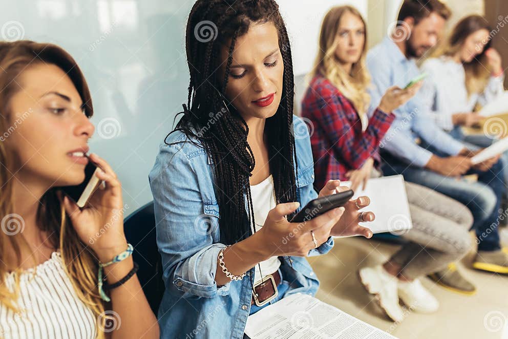 Students Using Mobile Phones Stock Image - Image of communication ...