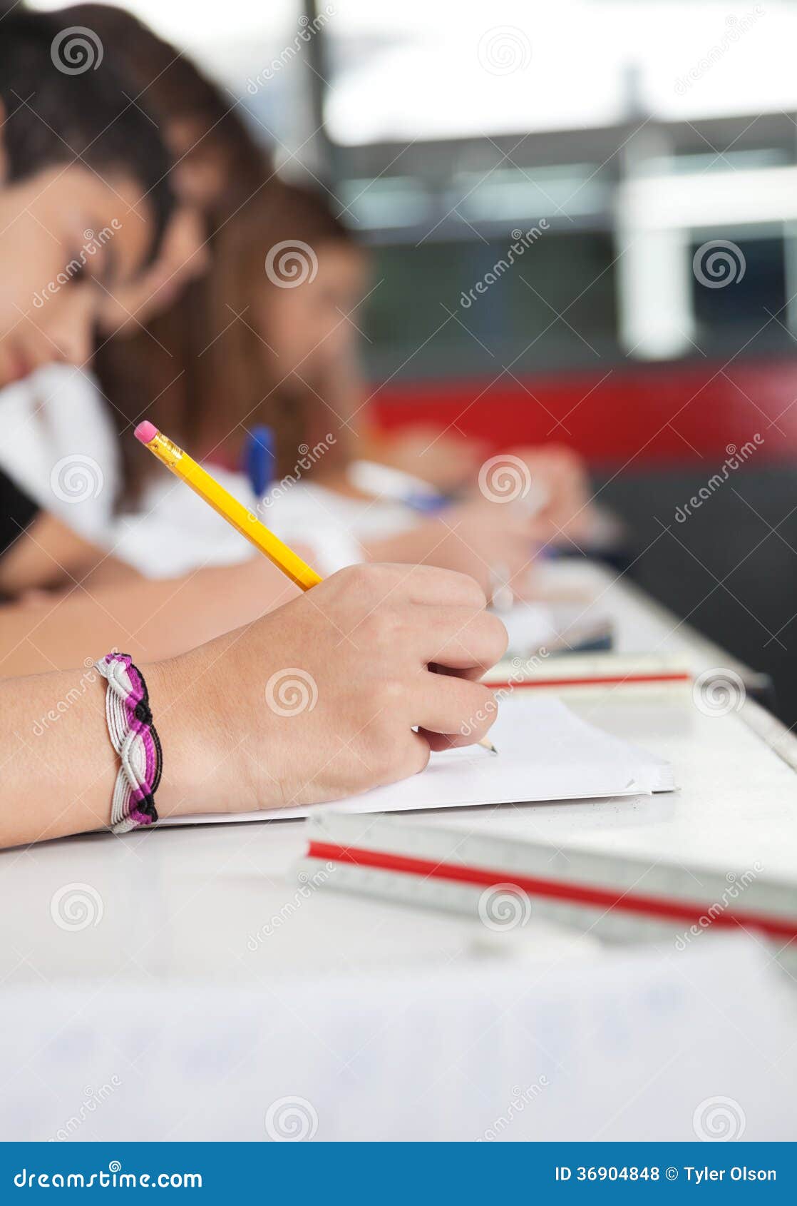 High School Students Writing at Desk Stock Photo - Image of knowledge ...